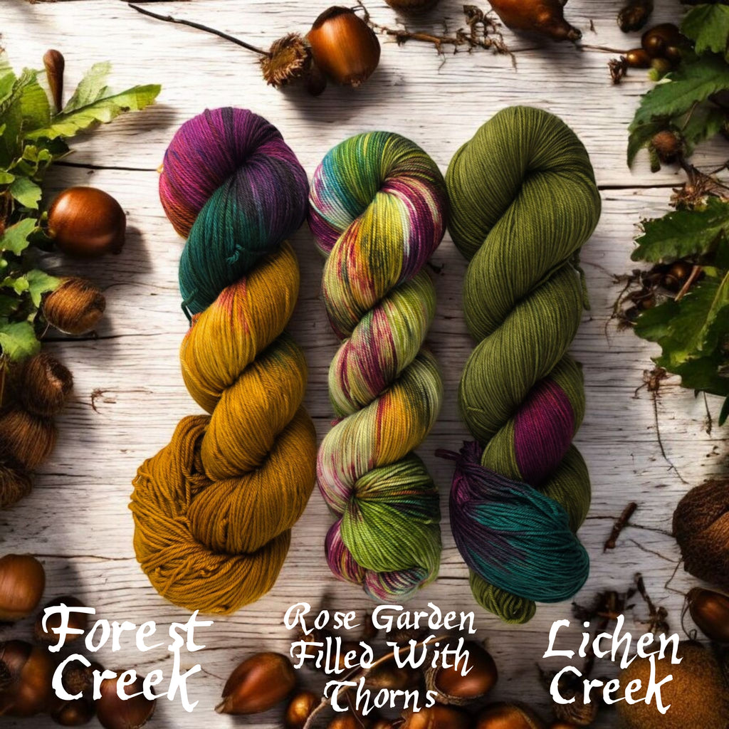Lichen Creek - Hand dyed assigned pooling yarn - moss green with burgu ...